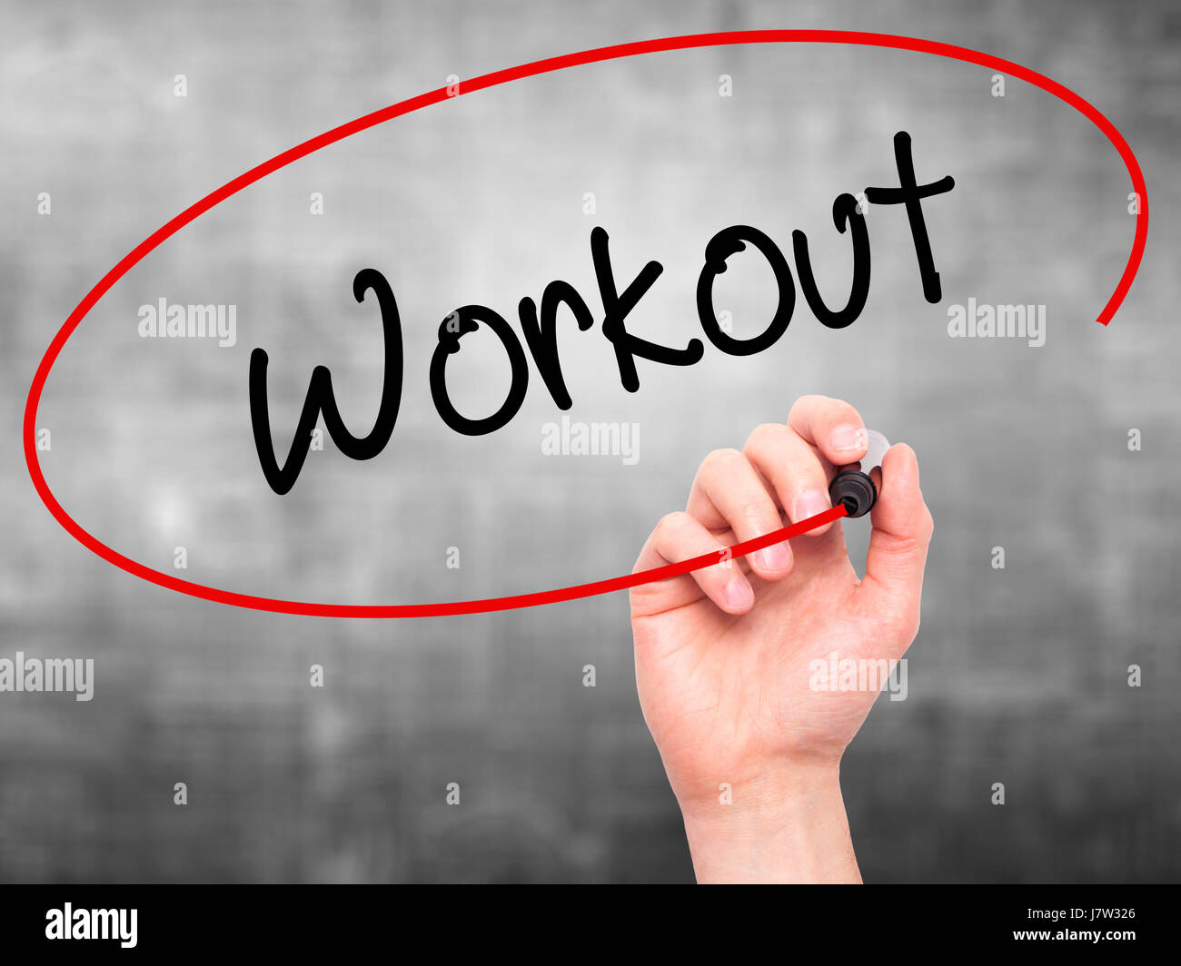 Man Hand writing Workout with black marker on visual screen. Isolated ...