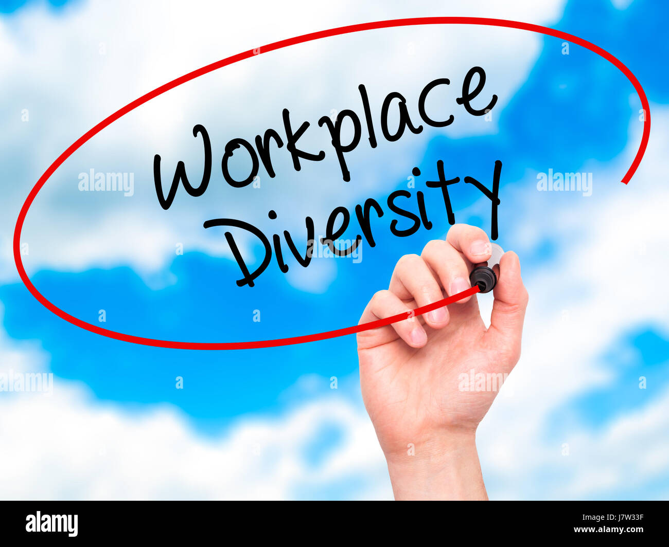 Man Hand writing Workplace Diversity with black marker on visual screen ...