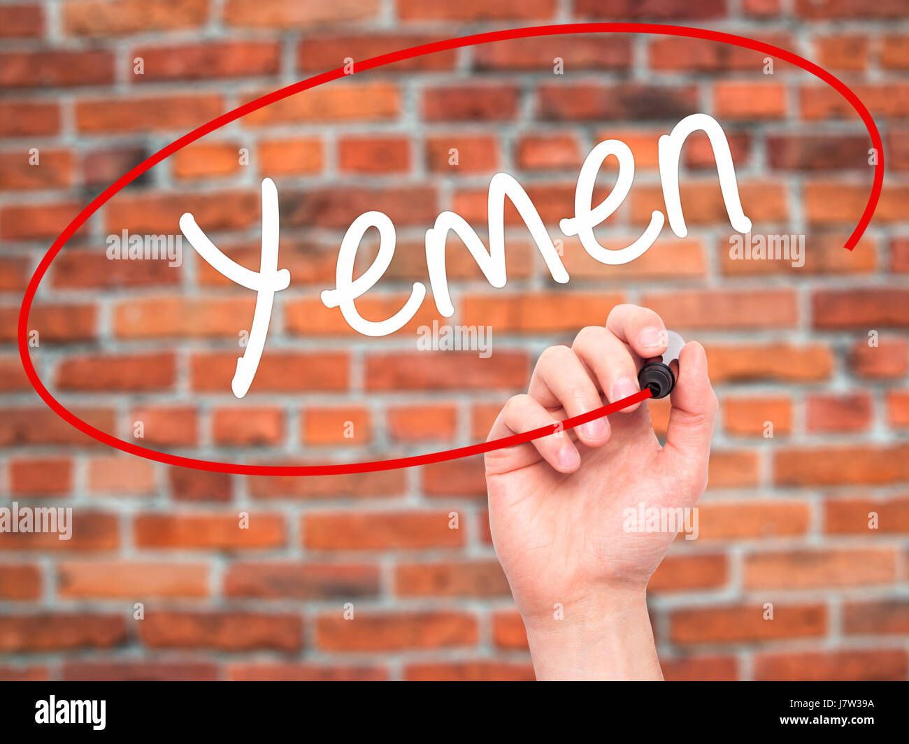 Man Hand writing Yemen with black marker on visual screen. Isolated on ...
