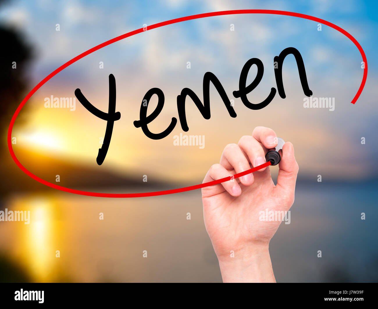 Man Hand writing Yemen with black marker on visual screen. Isolated on ...