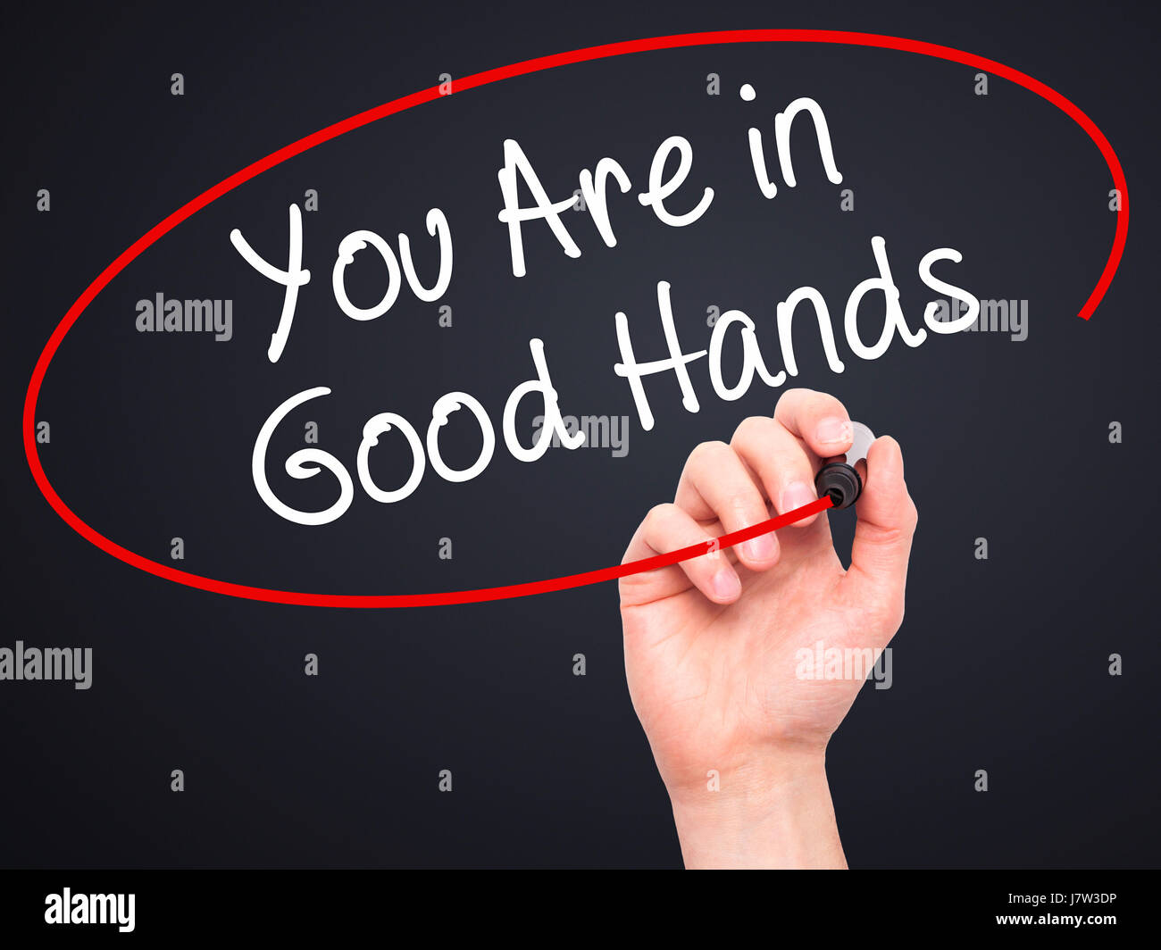 Man Hand writing You Are in Good Hands with black marker on visual ...