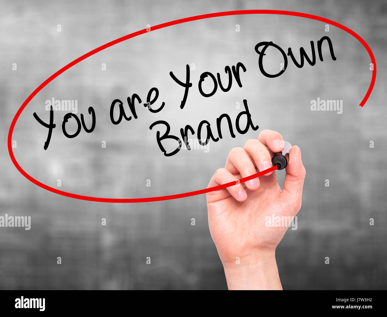 Man Hand writing You are Your Own Brand with black marker on visual ...