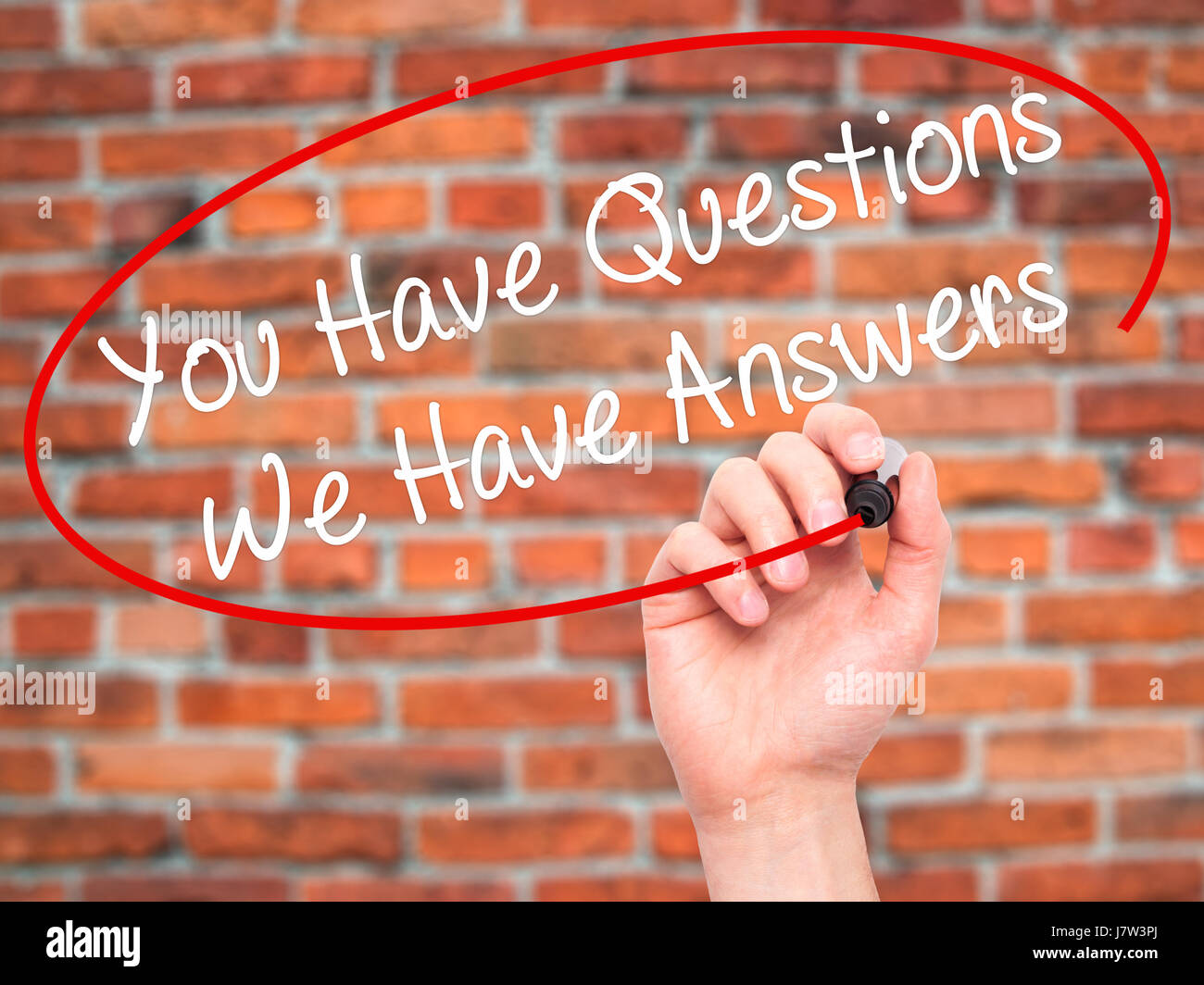 Man Hand writing You Have Questions We Have Answers with black marker ...