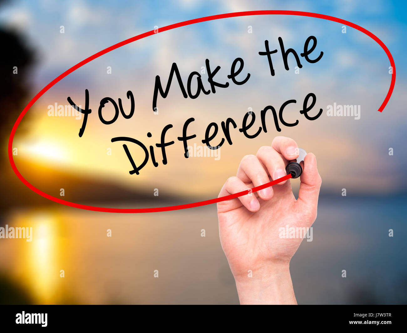 Man Hand writing You Make the Difference with black marker on visual ...