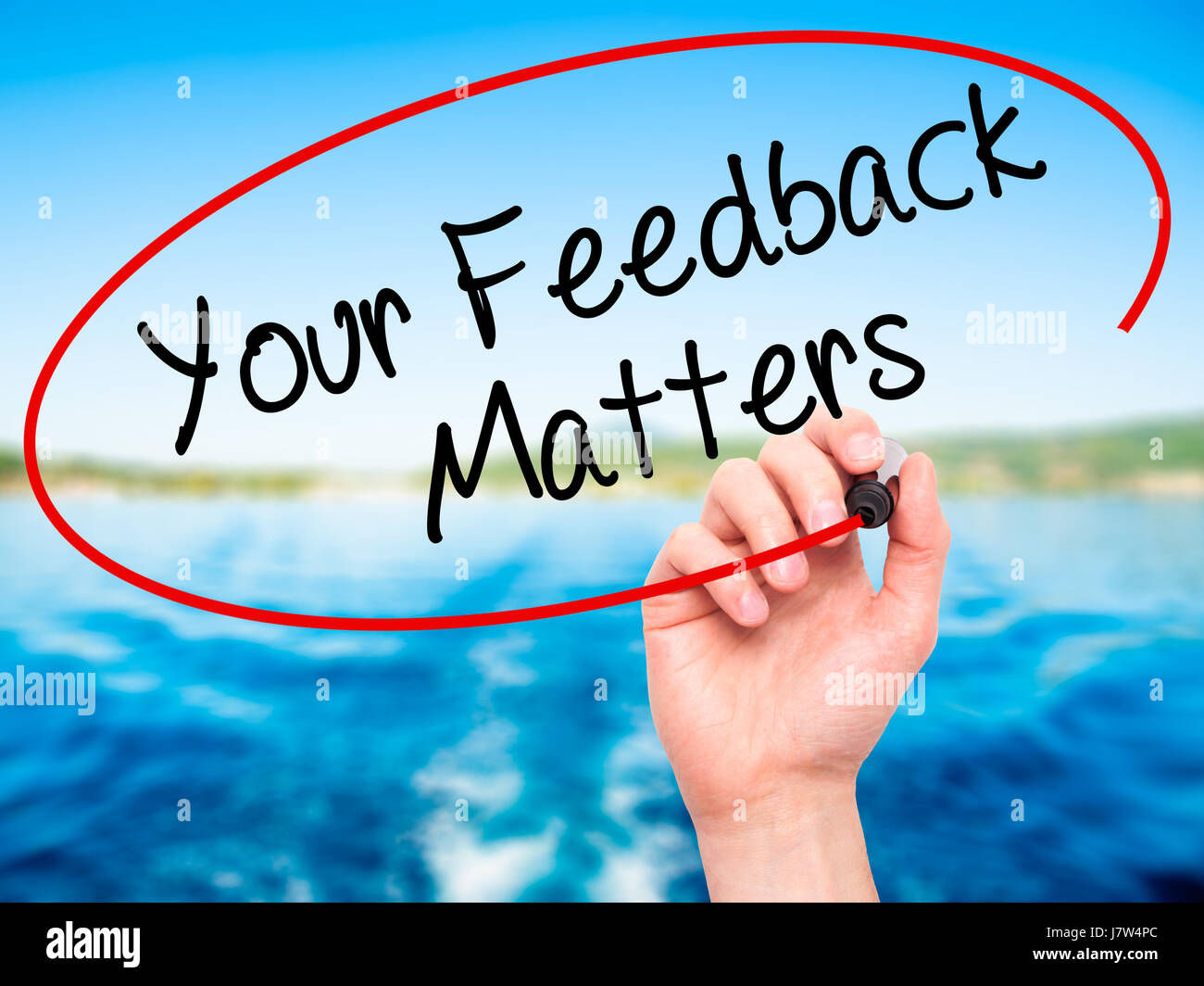 Man Hand writing Your Feedback Matters with black marker on visual ...