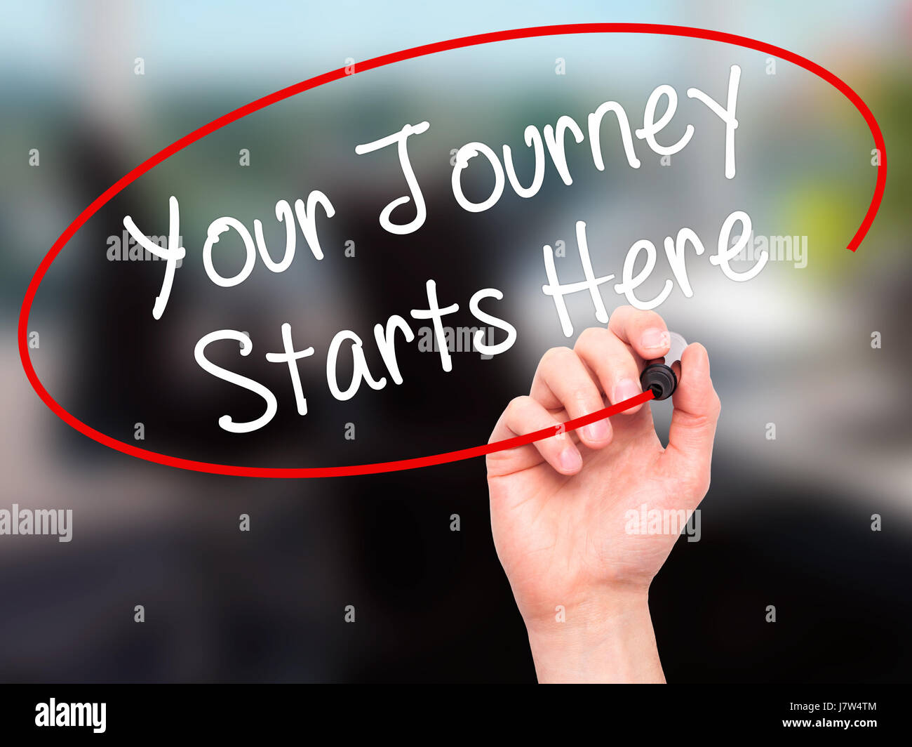 Man Hand writing Your Journey Starts Here with black marker on visual ...