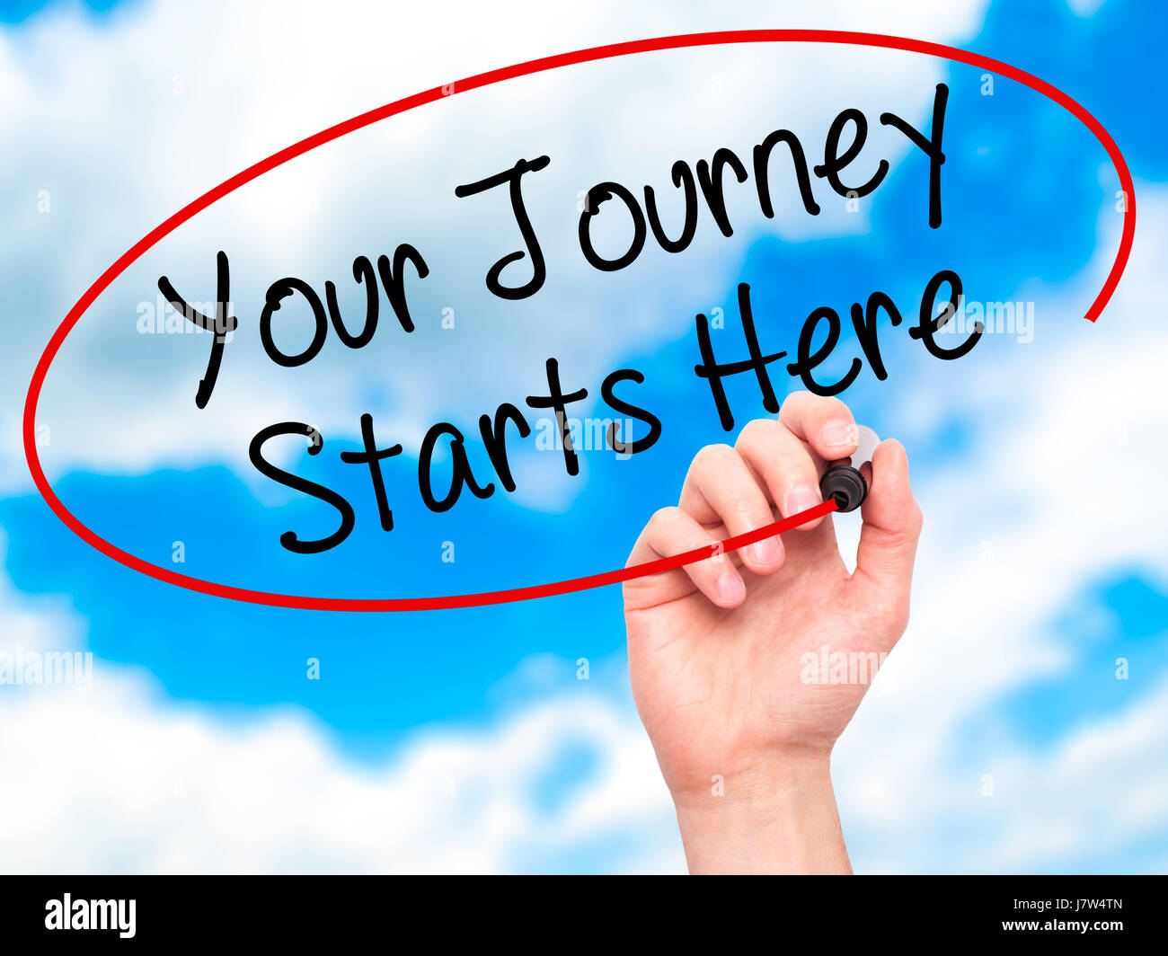 Man Hand writing Your Journey Starts Here with black marker on visual ...