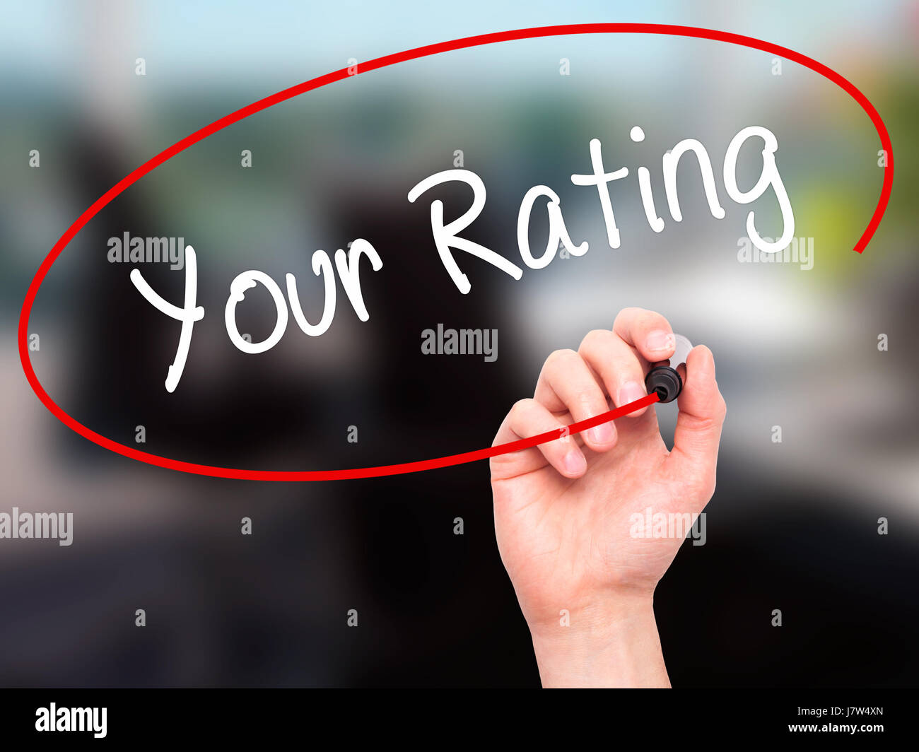 Man Hand writing Your Rating with black marker on visual screen ...
