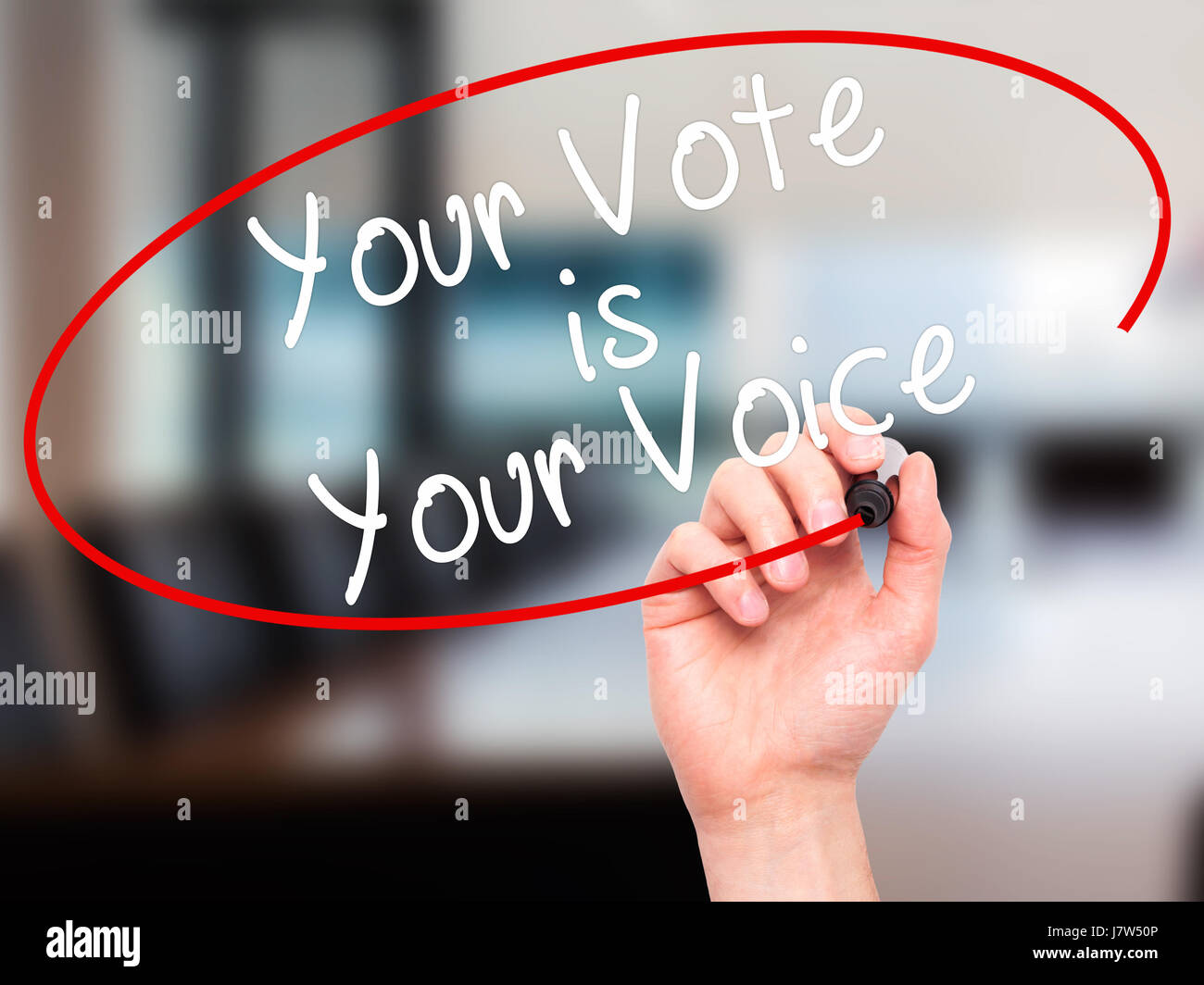 Man Hand writing Your Vote is Your Voice with black marker on visual ...