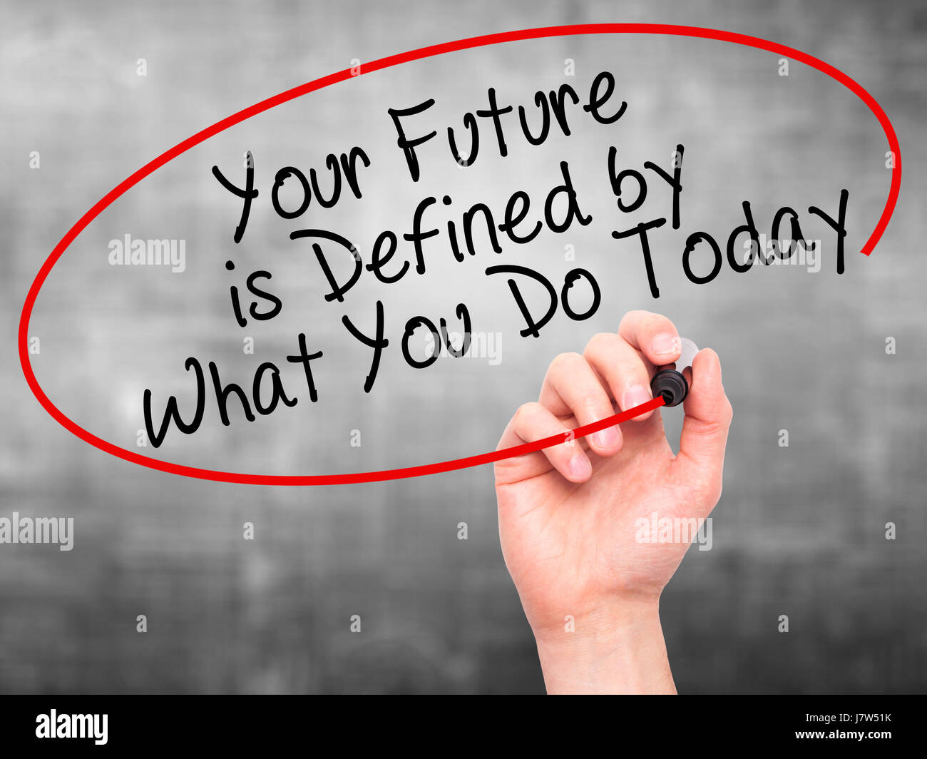 Man Hand writing Your Future is Defined by What You Do Today with black marker on visual screen ...