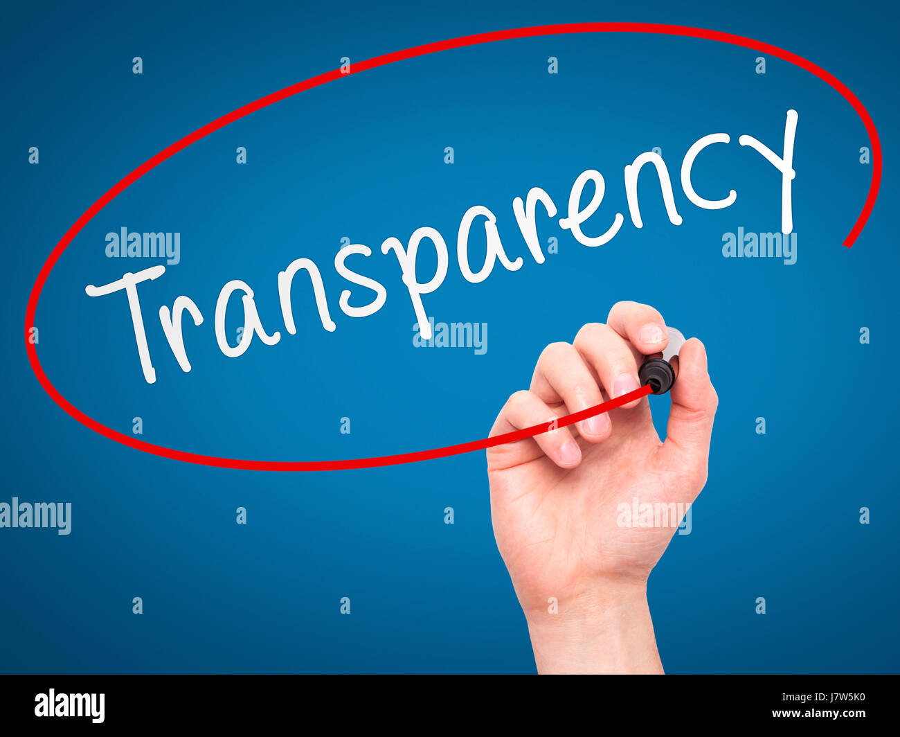 Man Hand writing Transparency with marker on transparent wipe board ...