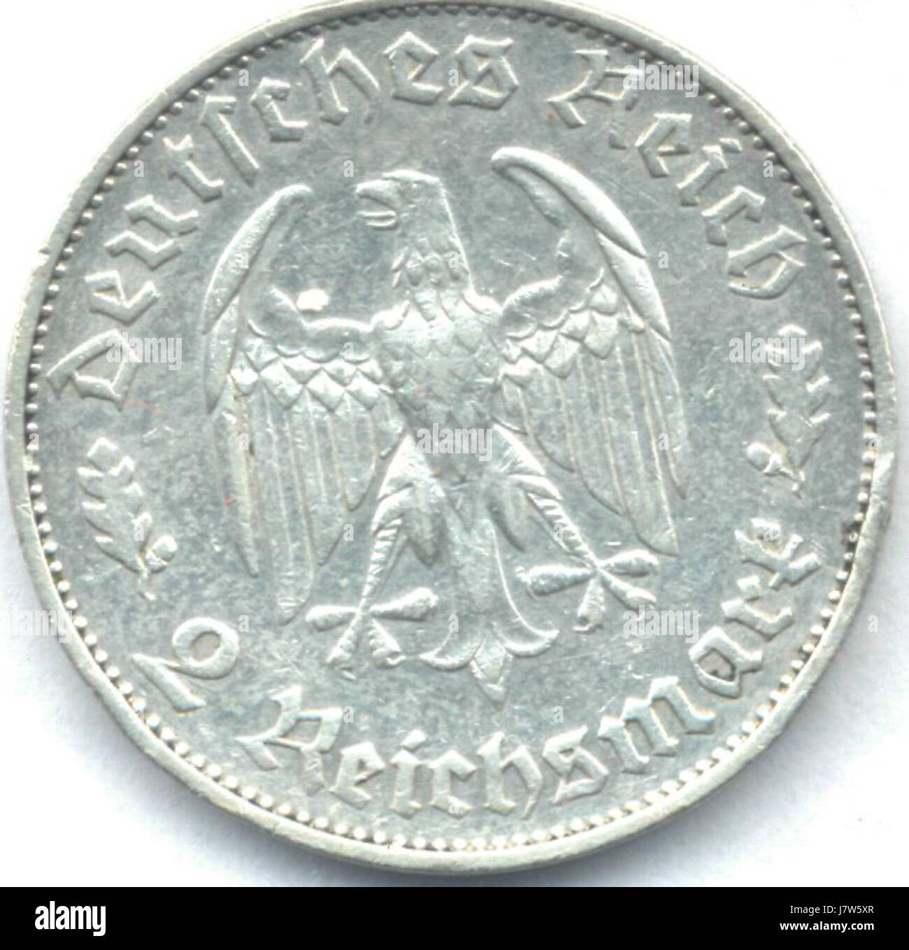 This coin represents the reverse side of a 2 Mark coin, which was in ...