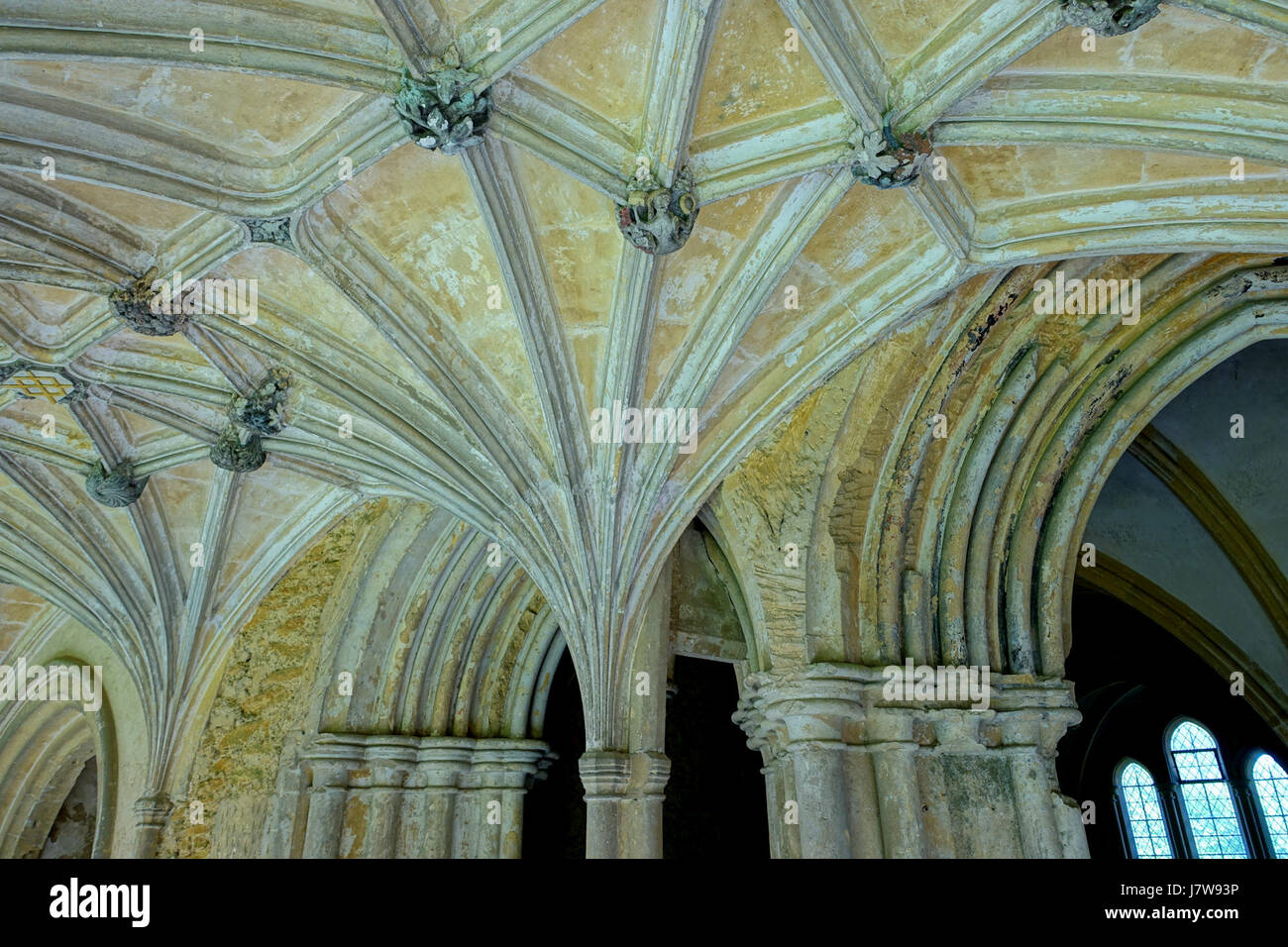 The cloisters of Lacock Abbey in Wiltshire, England, are a striking ...