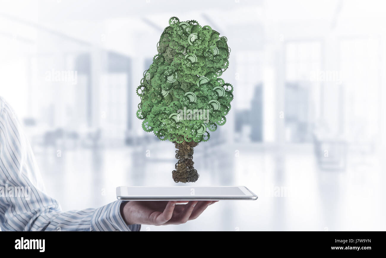 Eco green environment concept presented by tree as working mecha Stock ...