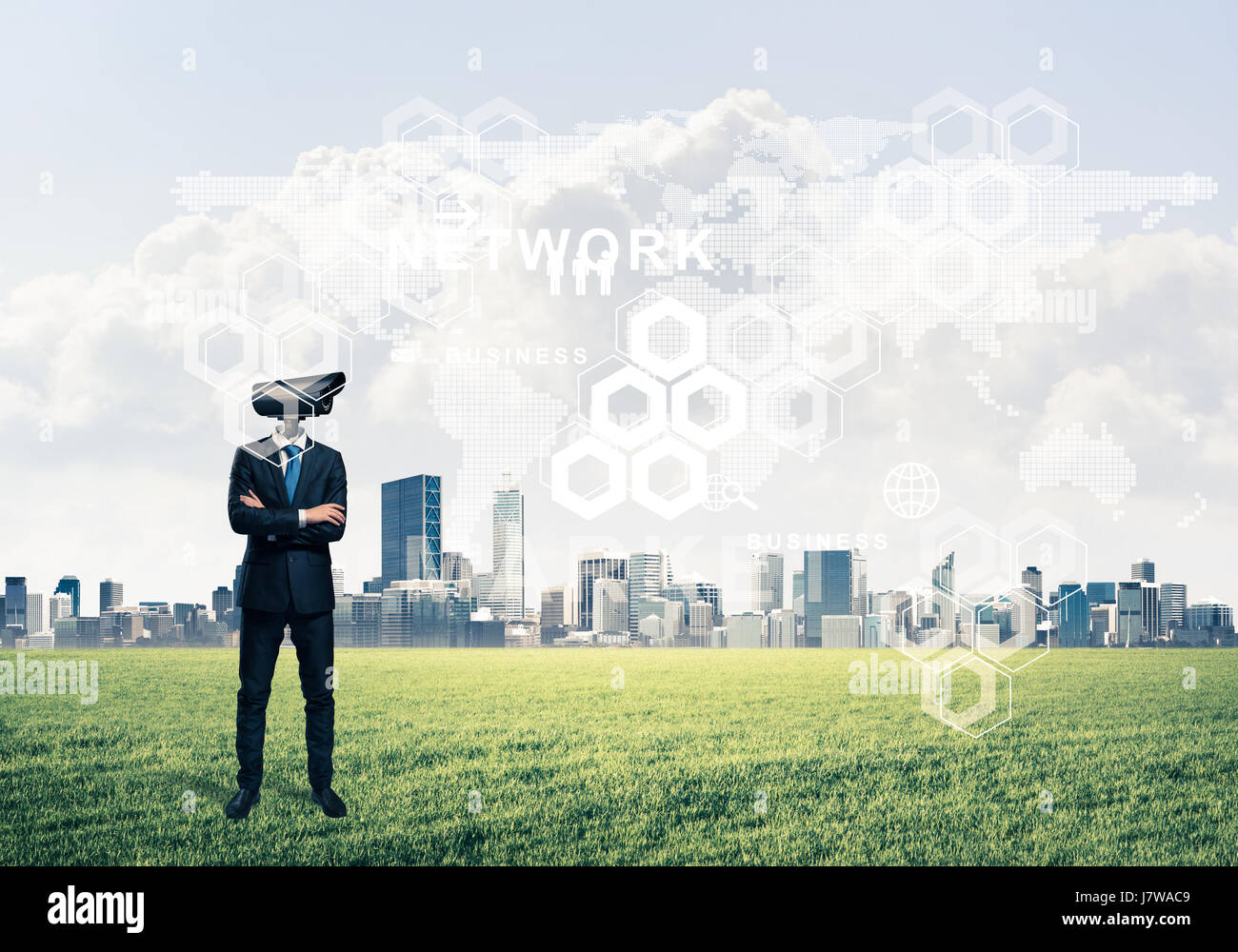 Camera headed man standing on green grass against modern citysca Stock ...