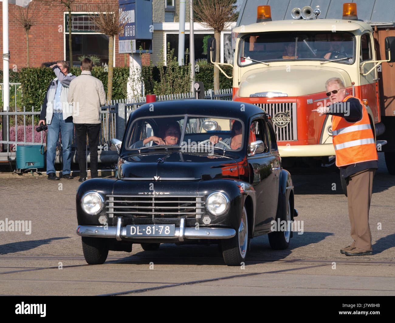 This image shows a 1955 Volvo PV 444 H, a compact and stylish car with ...