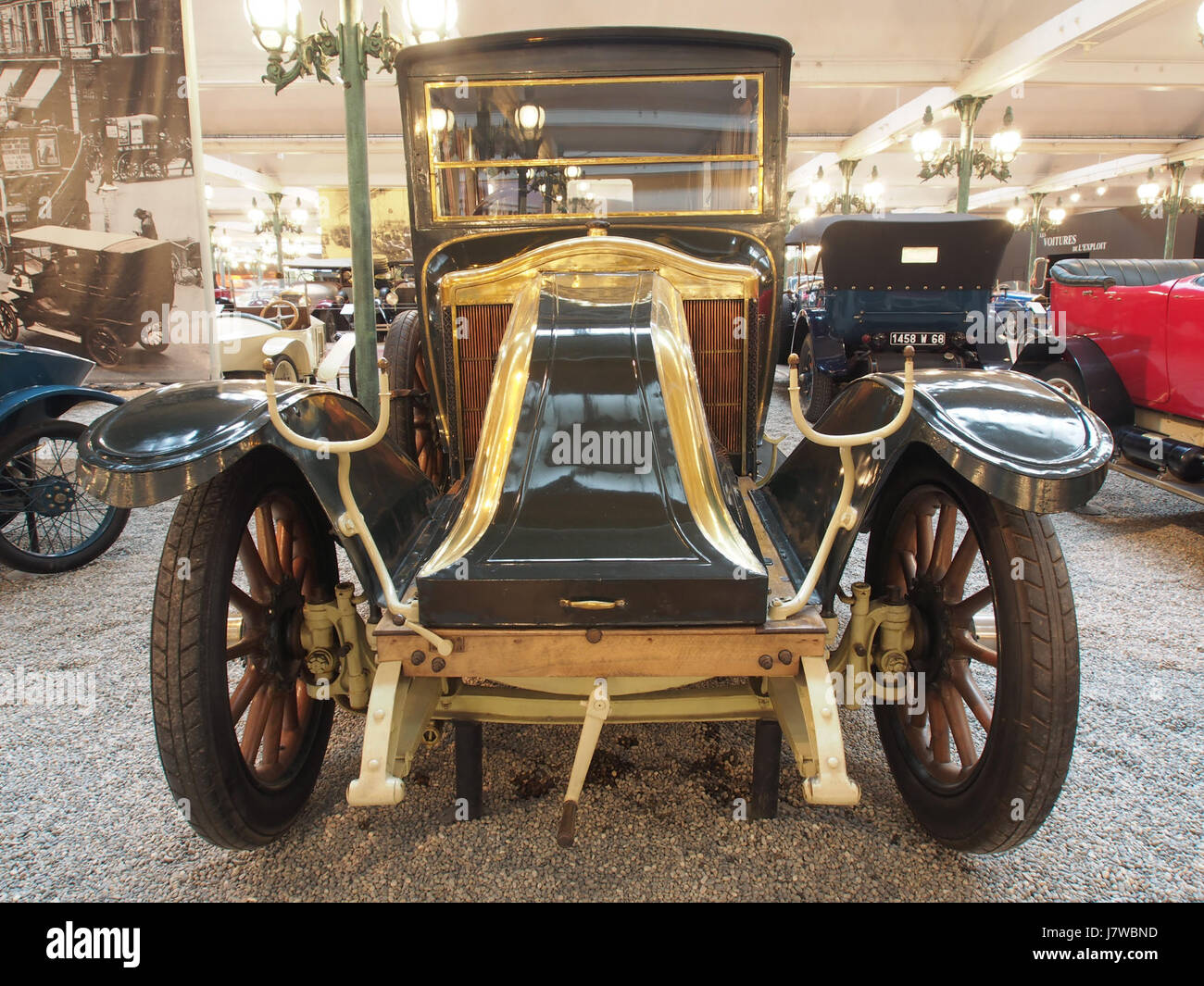 This image depicts a 1920 Renault Limousine, an early 20th-century ...