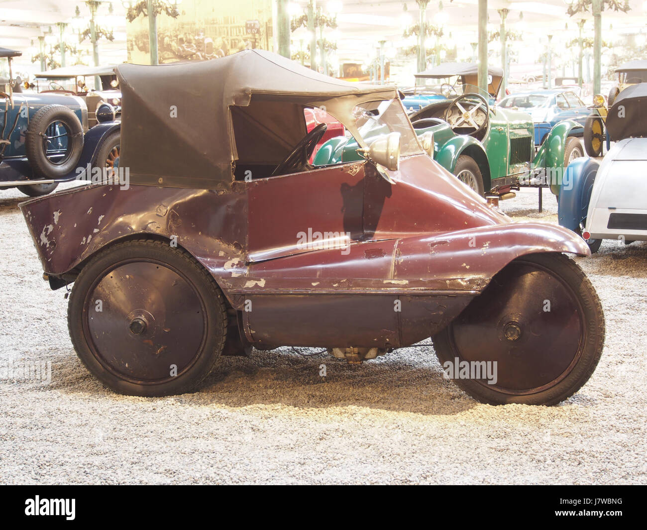 Photograph of a 1923 SCOTT Tricar, a three-wheeled vehicle featuring a ...