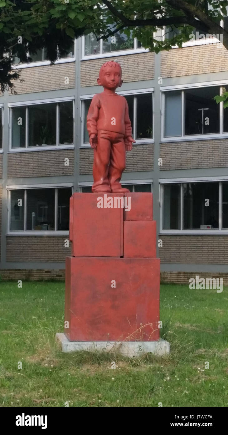 'Red Boy' by Kenny Hunter is a contemporary sculpture, symbolizing ...