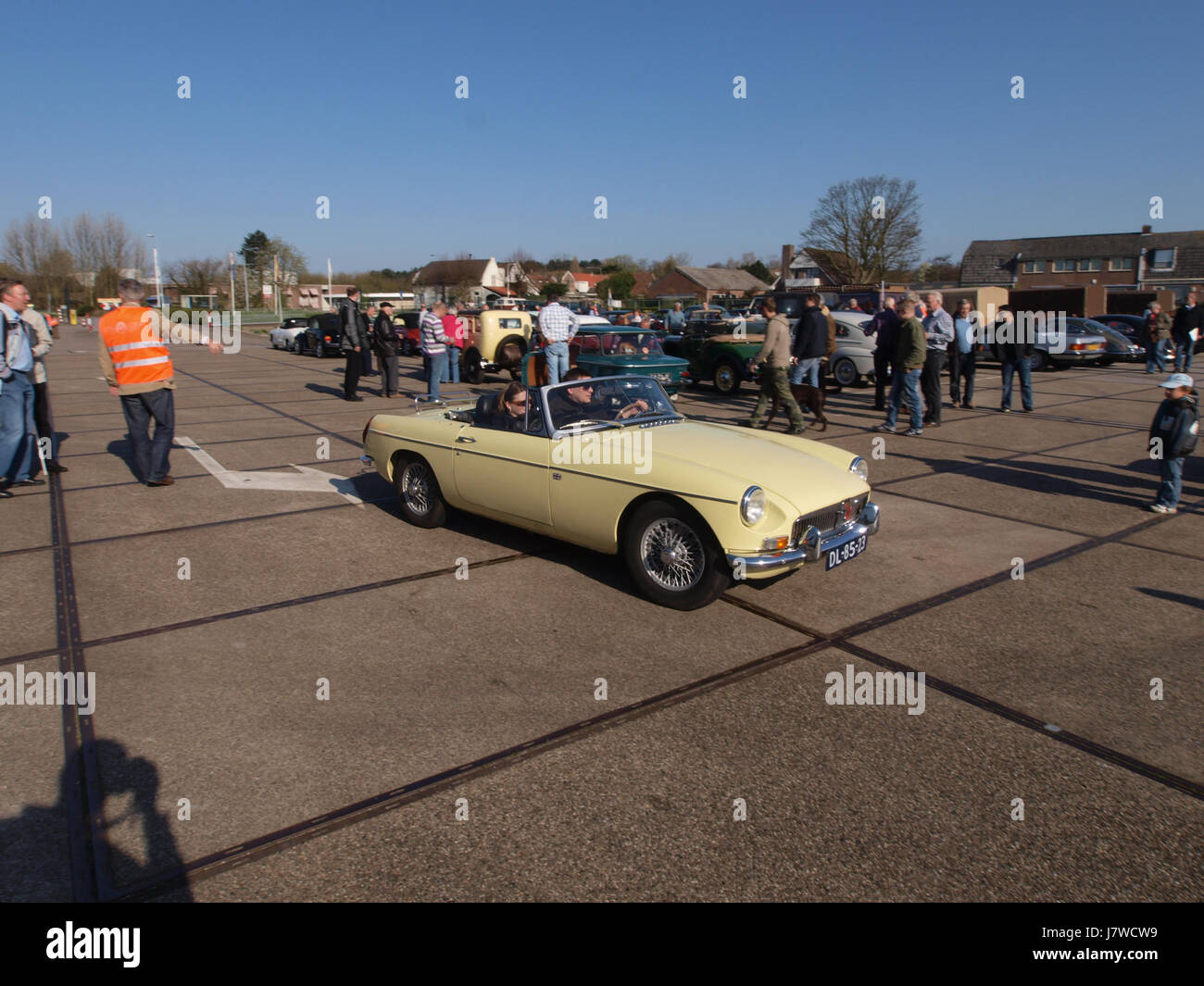 A vintage photograph of a 1971 MG B sports car, featuring its classic ...