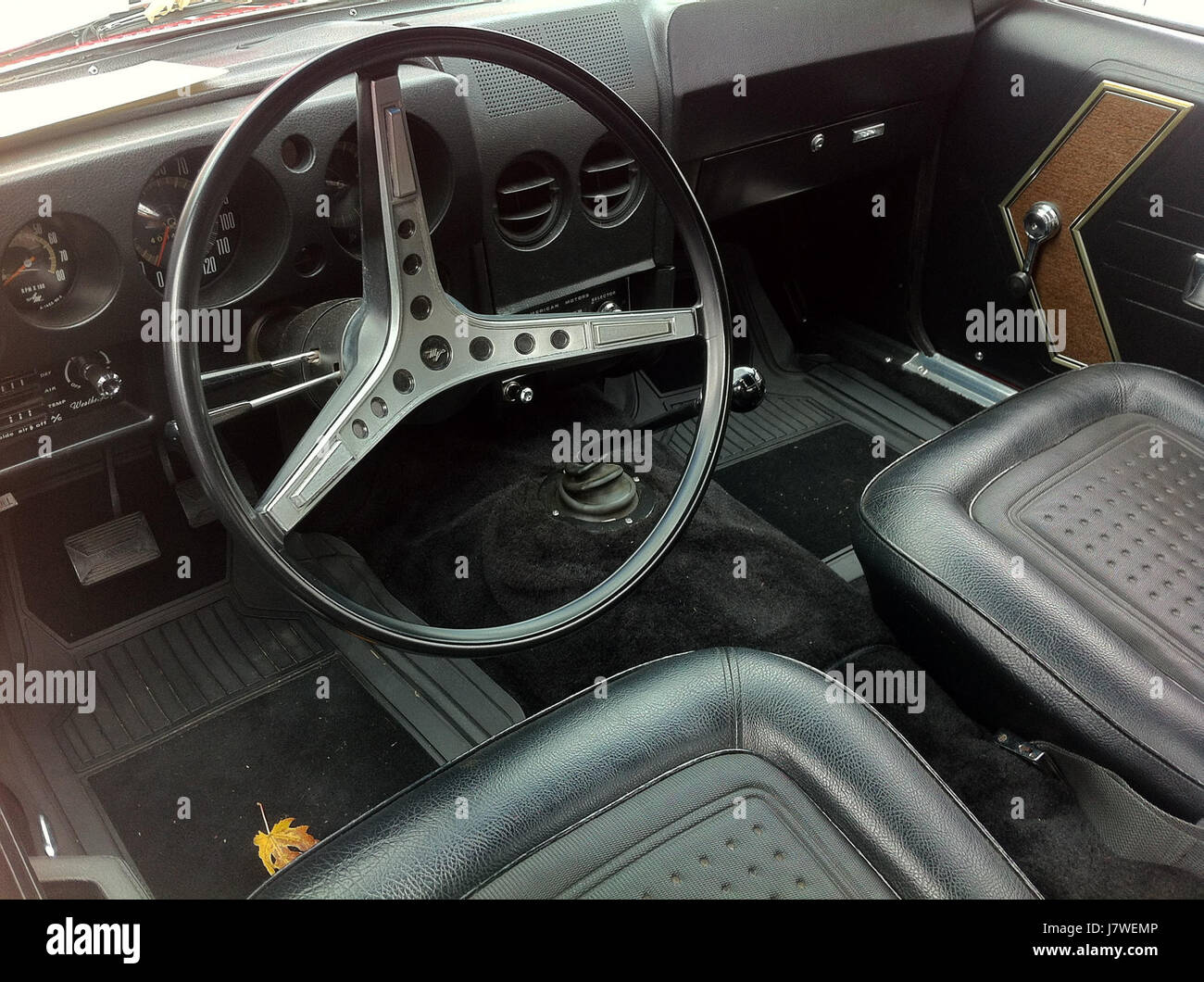 This 1968 AMC AMX, painted red and featuring the Go Pack 390 4-speed ...