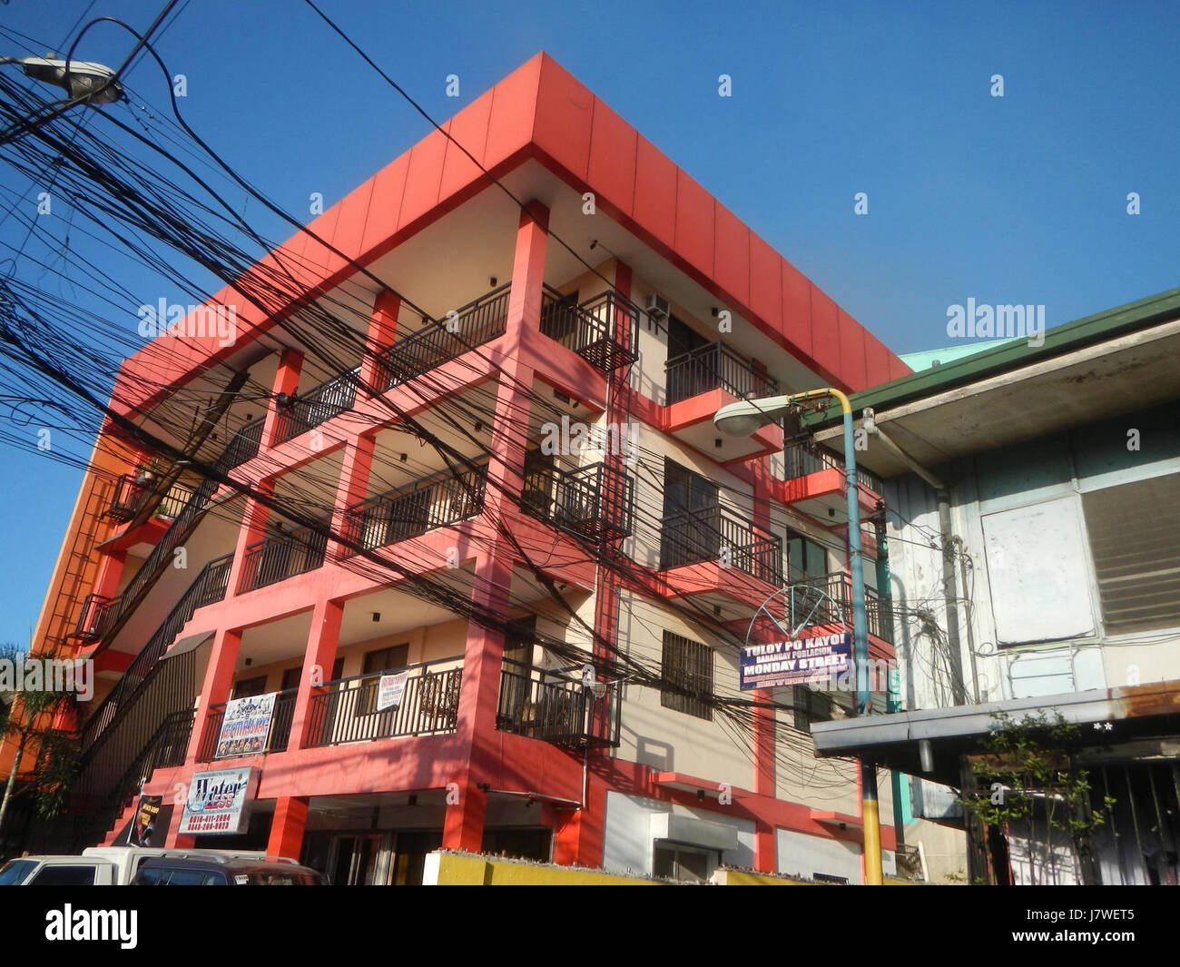 This image depicts a street scene along Boni Avenue in Mandaluyong City ...