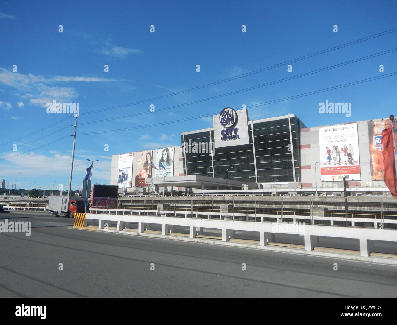 This photo features the footbridge at the Marcos Highway Bridge in ...
