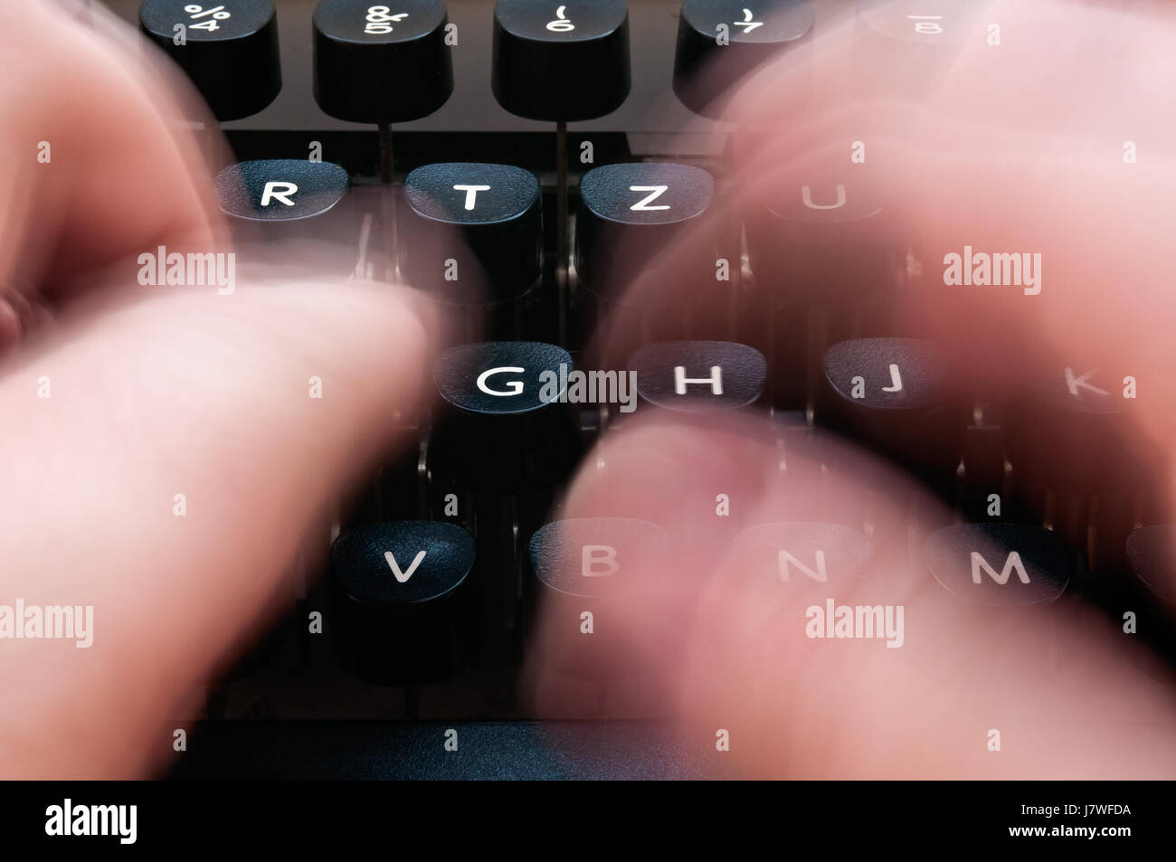 writing on a typewriter Stock Photo - Alamy