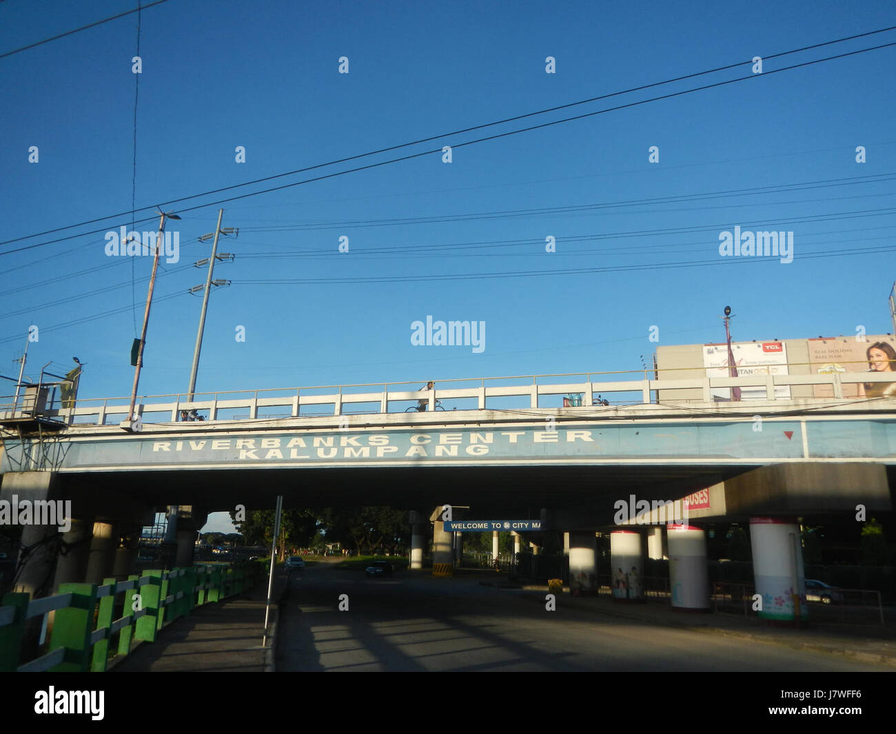 This image features the SM City Marikina Flyover and the Marcos Bridge ...