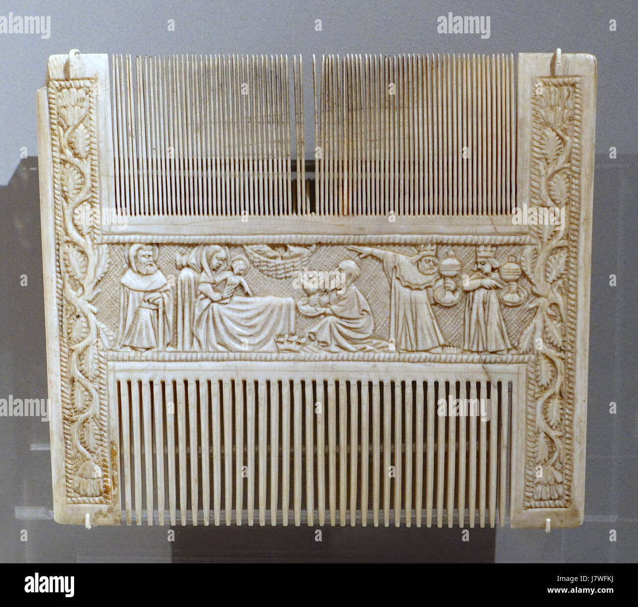 This 14th-century ivory comb features a scene from the Adoration of the ...