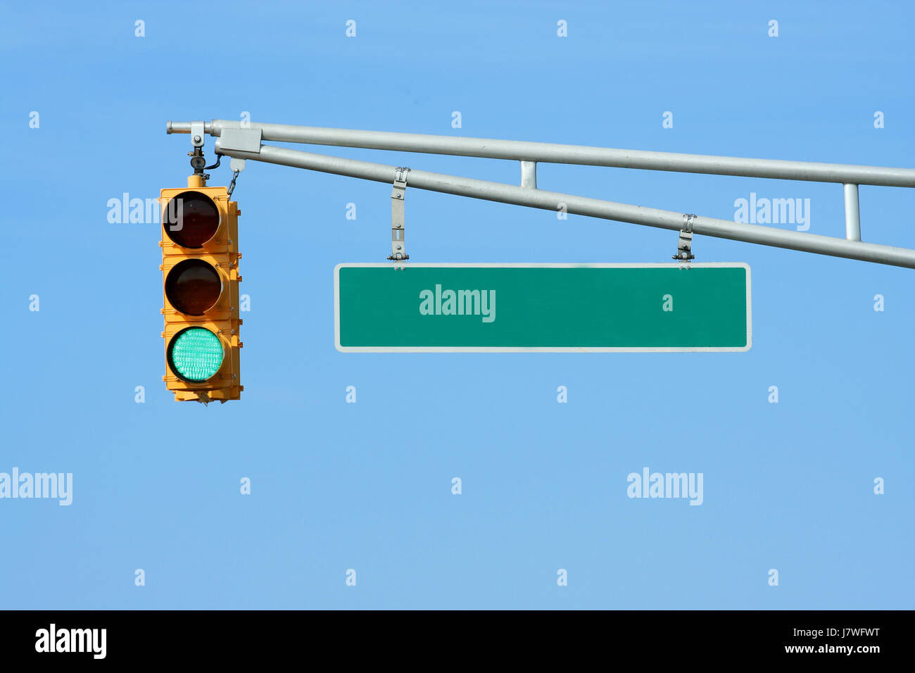 sign signal blue closeup traffic transportation green pole stop hanging ...