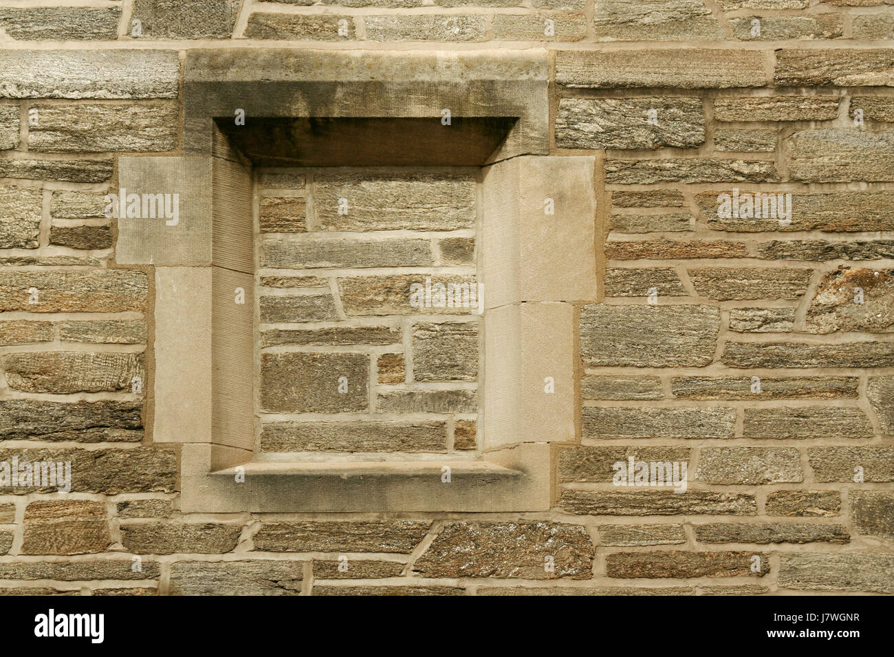 stone window porthole dormer window pane wall covered cement old ...