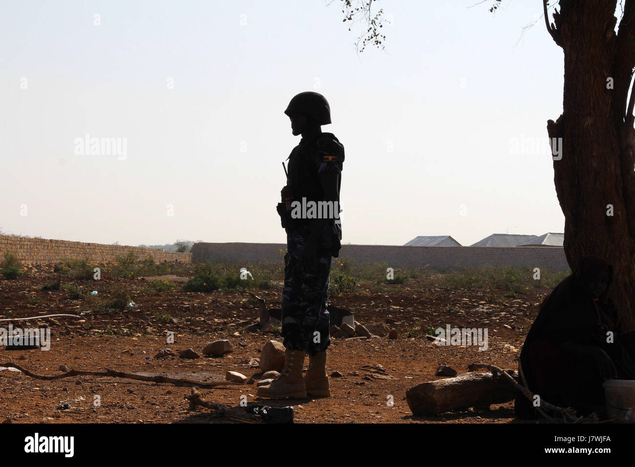 The image captures a 2012 foot patrol in Baidoa, Somalia, where ...