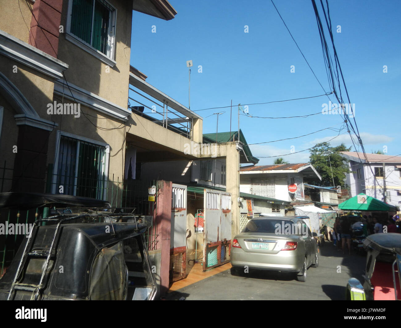 This image presents a view of Old Bocaue Poblacion in Bulacan ...