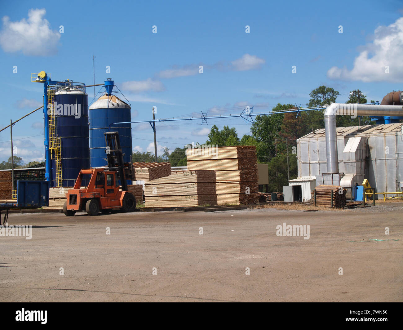 Forklift truck timber wood lumber planks sawmill wood hi-res stock ...