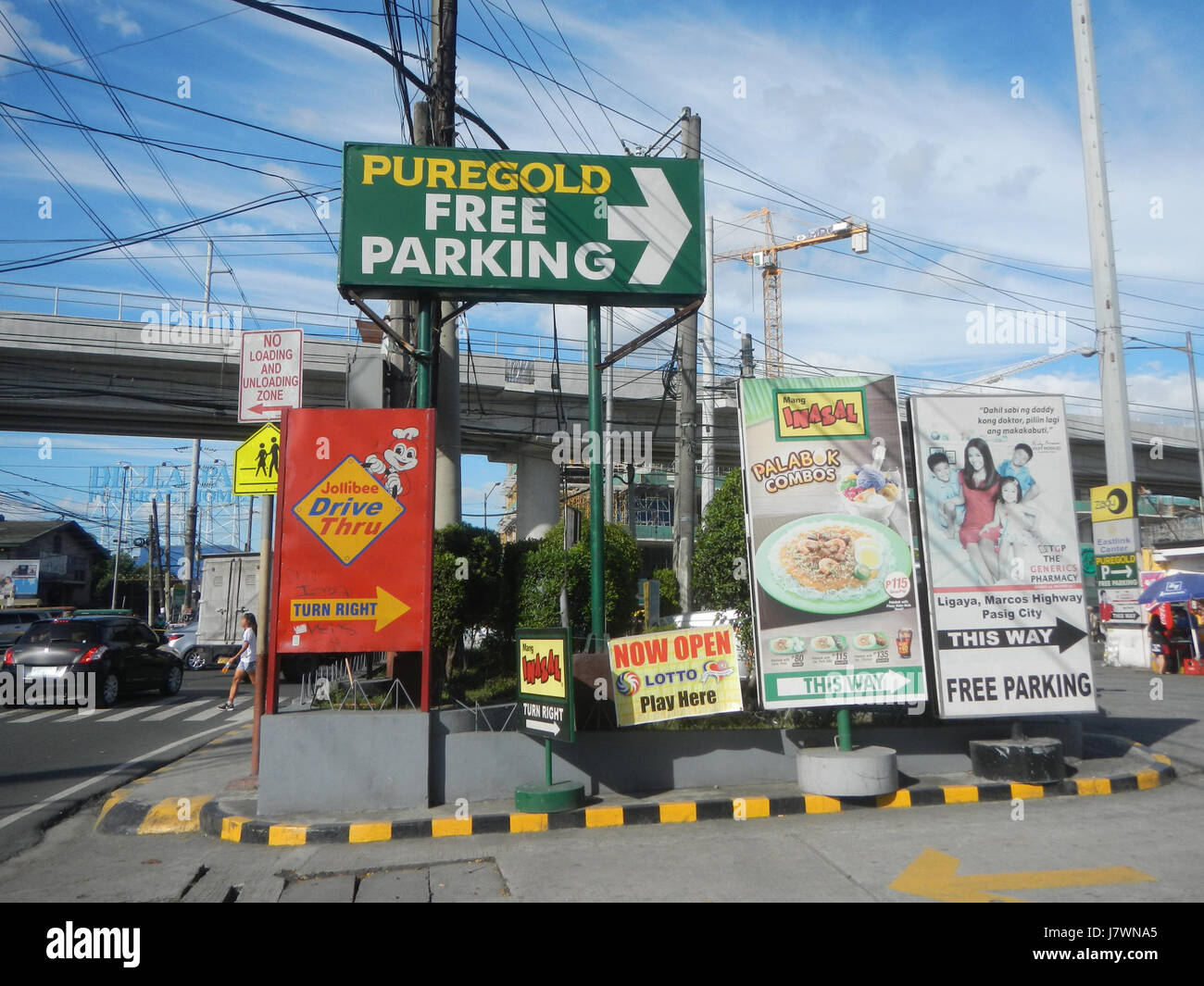 The photograph highlights the bustling road intersection at Marcos ...