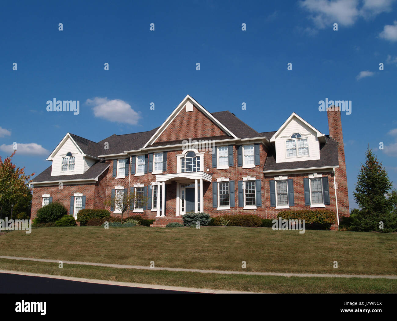 house building outside brick real estate exterior home private blue ...