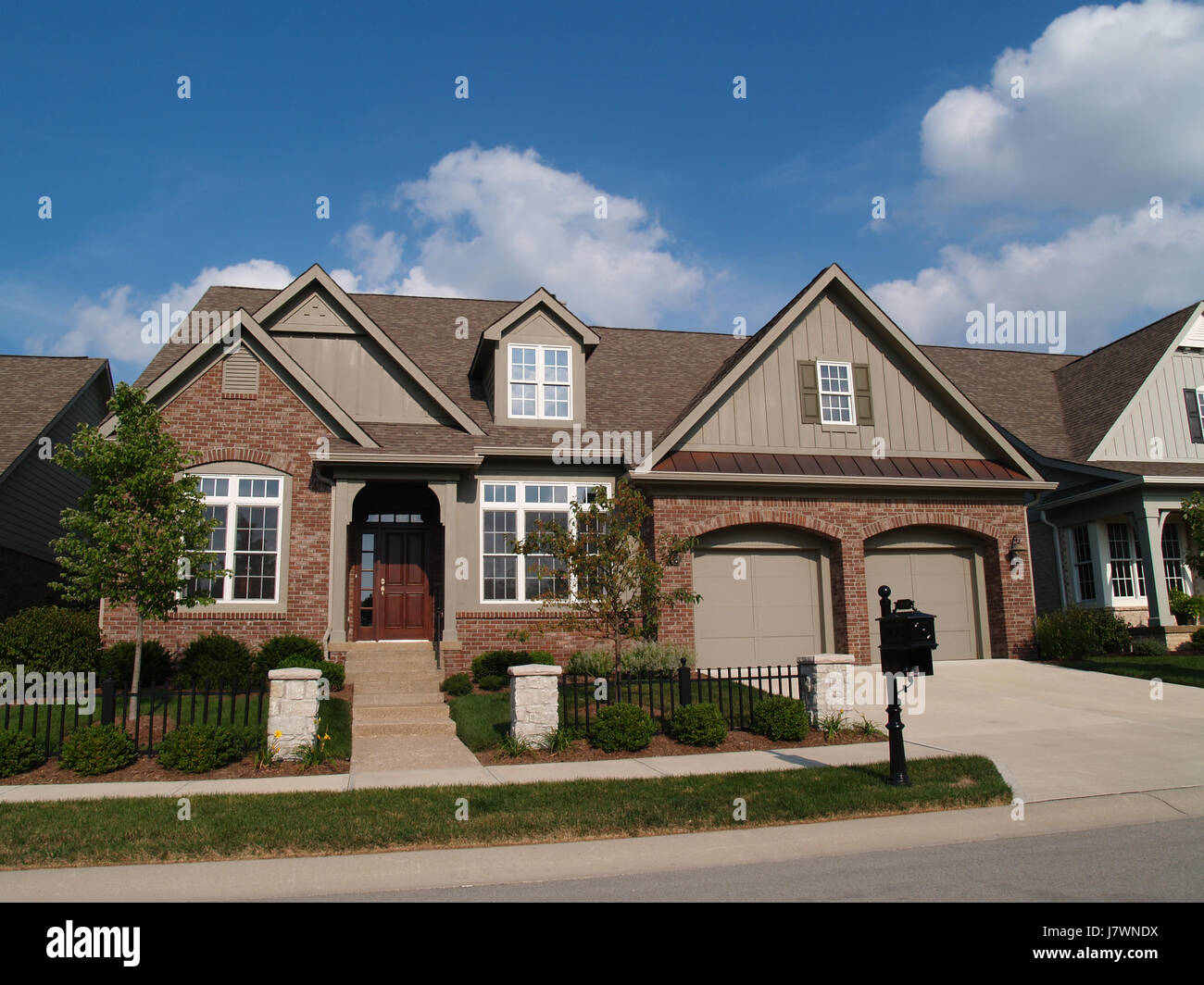 house building small tiny little short outside garage brick real estate ...