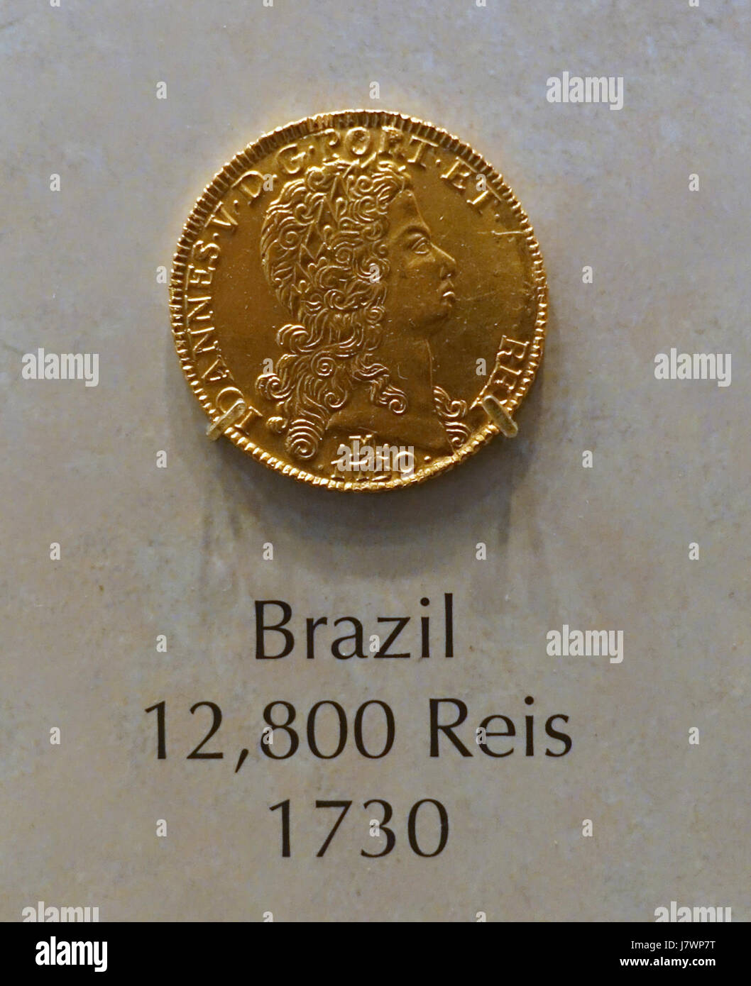This 12,800 Reis gold coin from Brazil, minted in 1730 during the reign ...