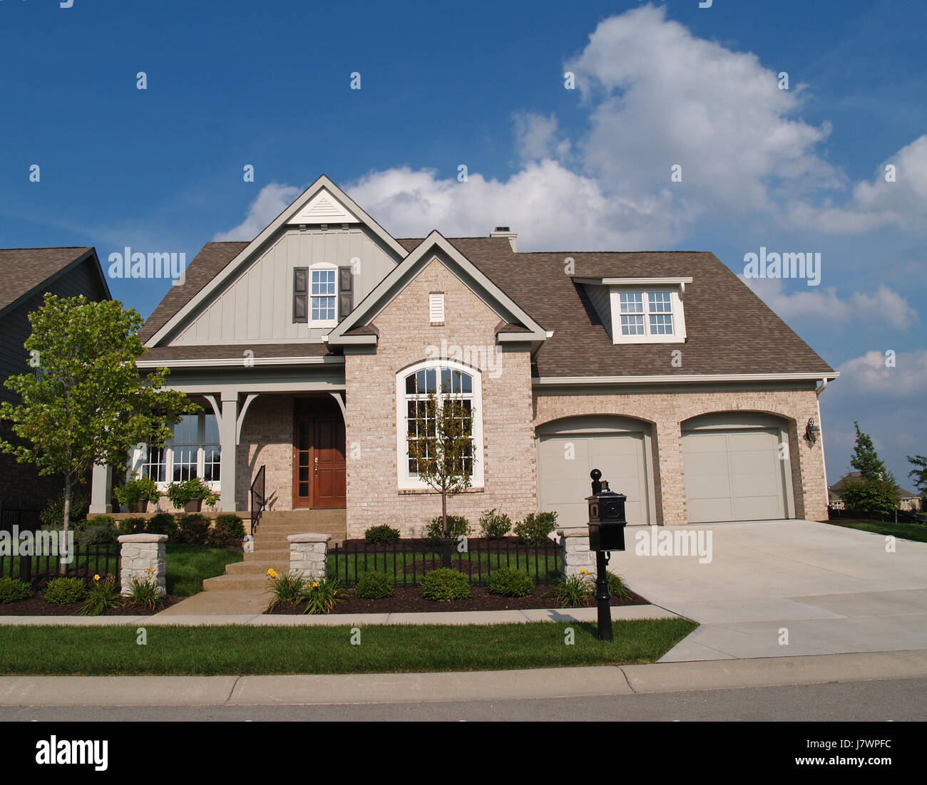 house building small tiny little short outside garage brick real estate ...