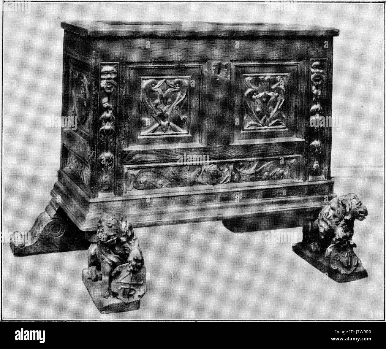This sculpted oak casket is a finely crafted piece, likely from the ...