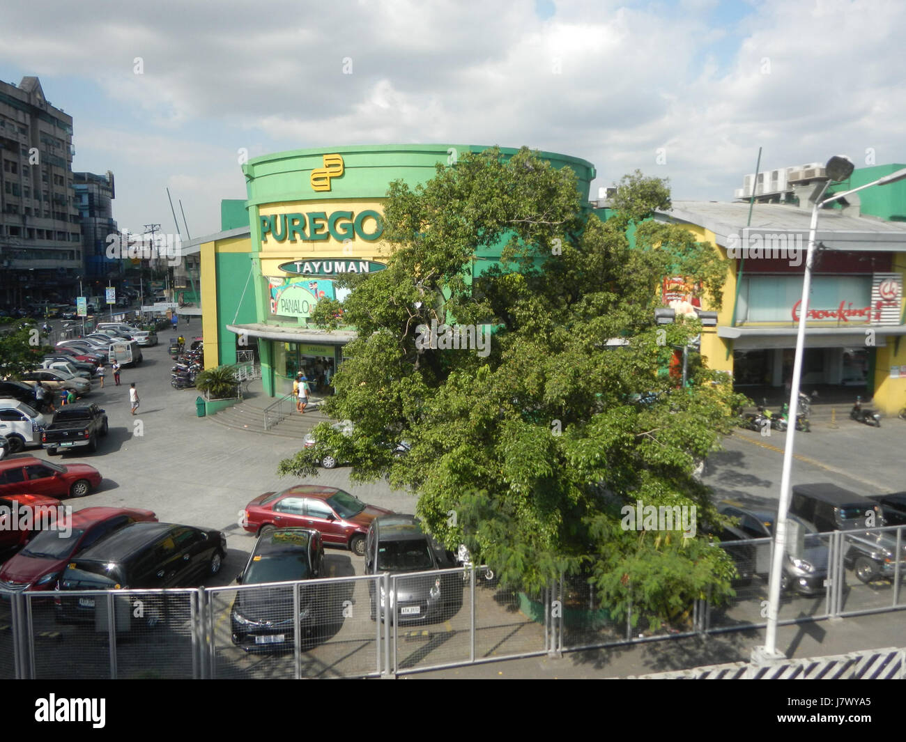 This image features a pedestrian footbridge in Tondo, Manila ...