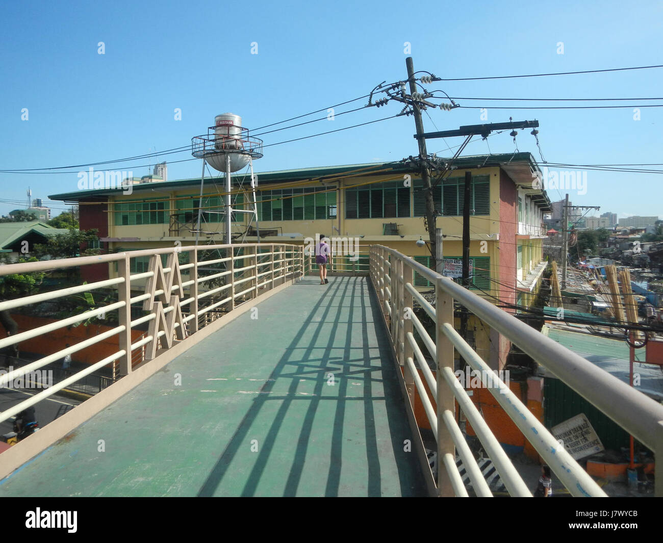 This pedestrian footbridge connects key areas in Tondo, Manila ...