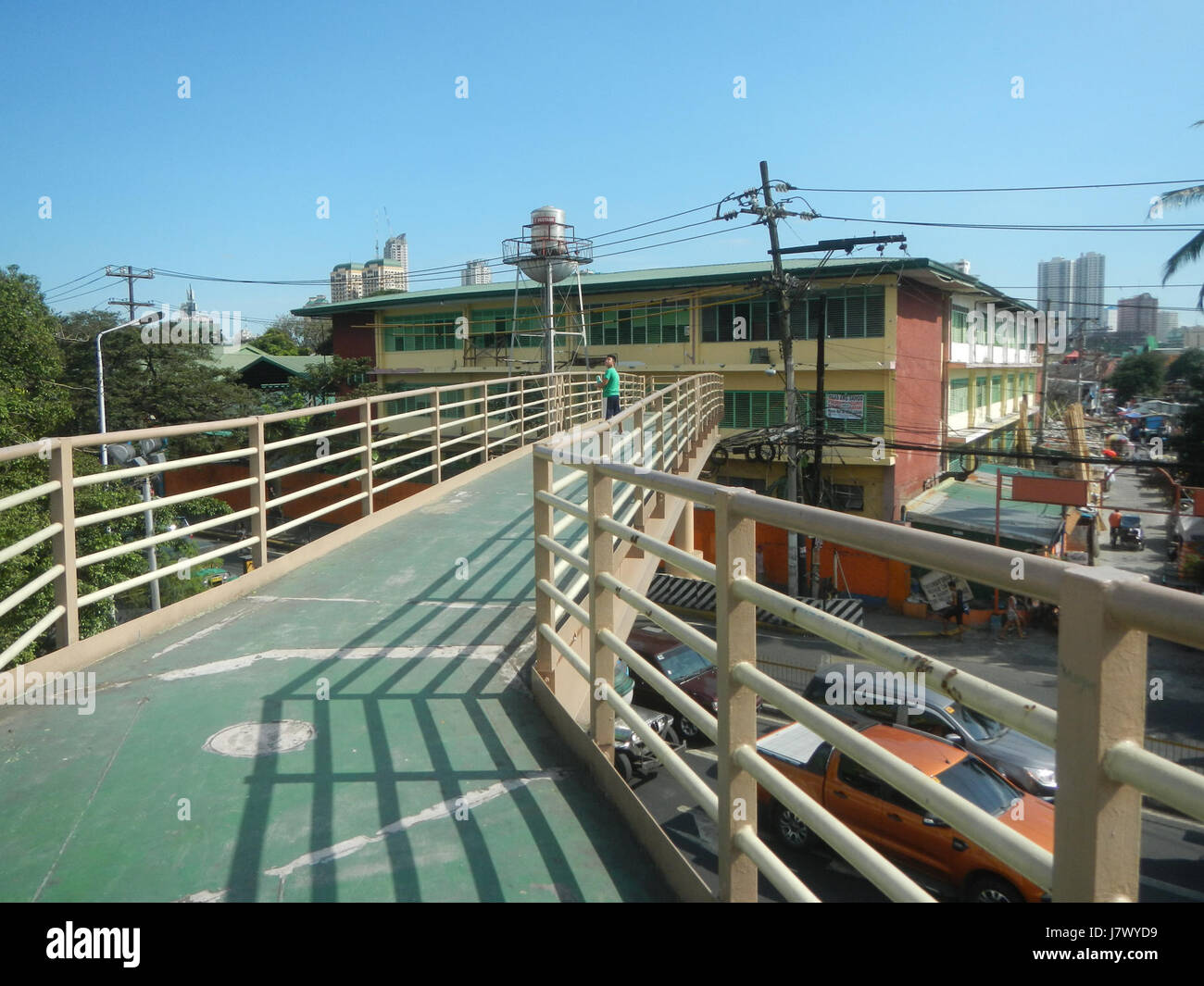 This image shows the pedestrian footbridge at Puregold Tayuman, located ...