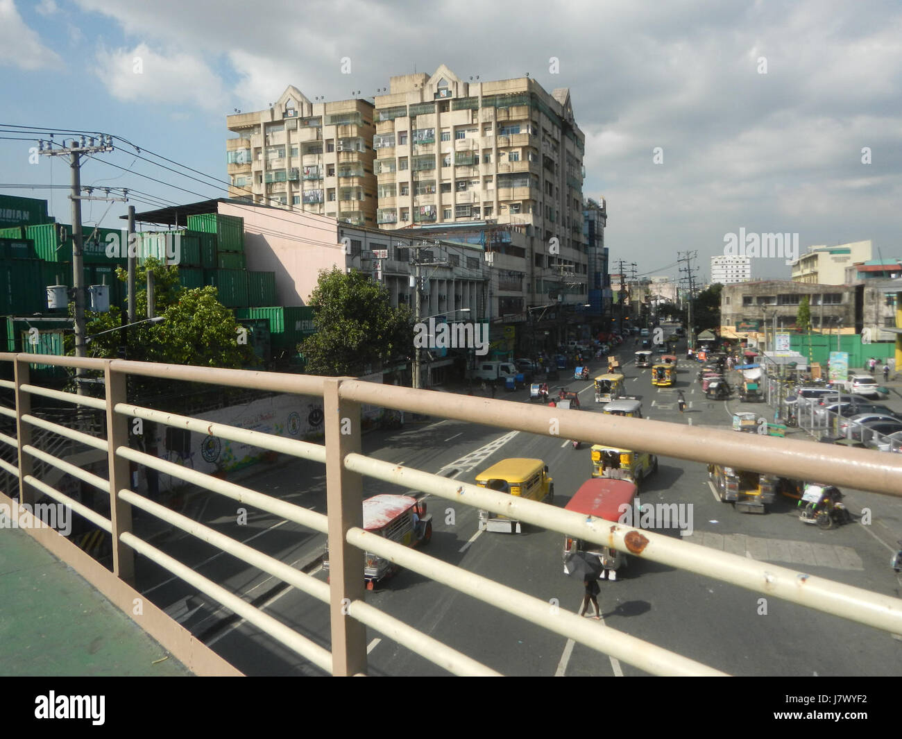 This image shows a pedestrian footbridge located at Puregold Tayuman ...