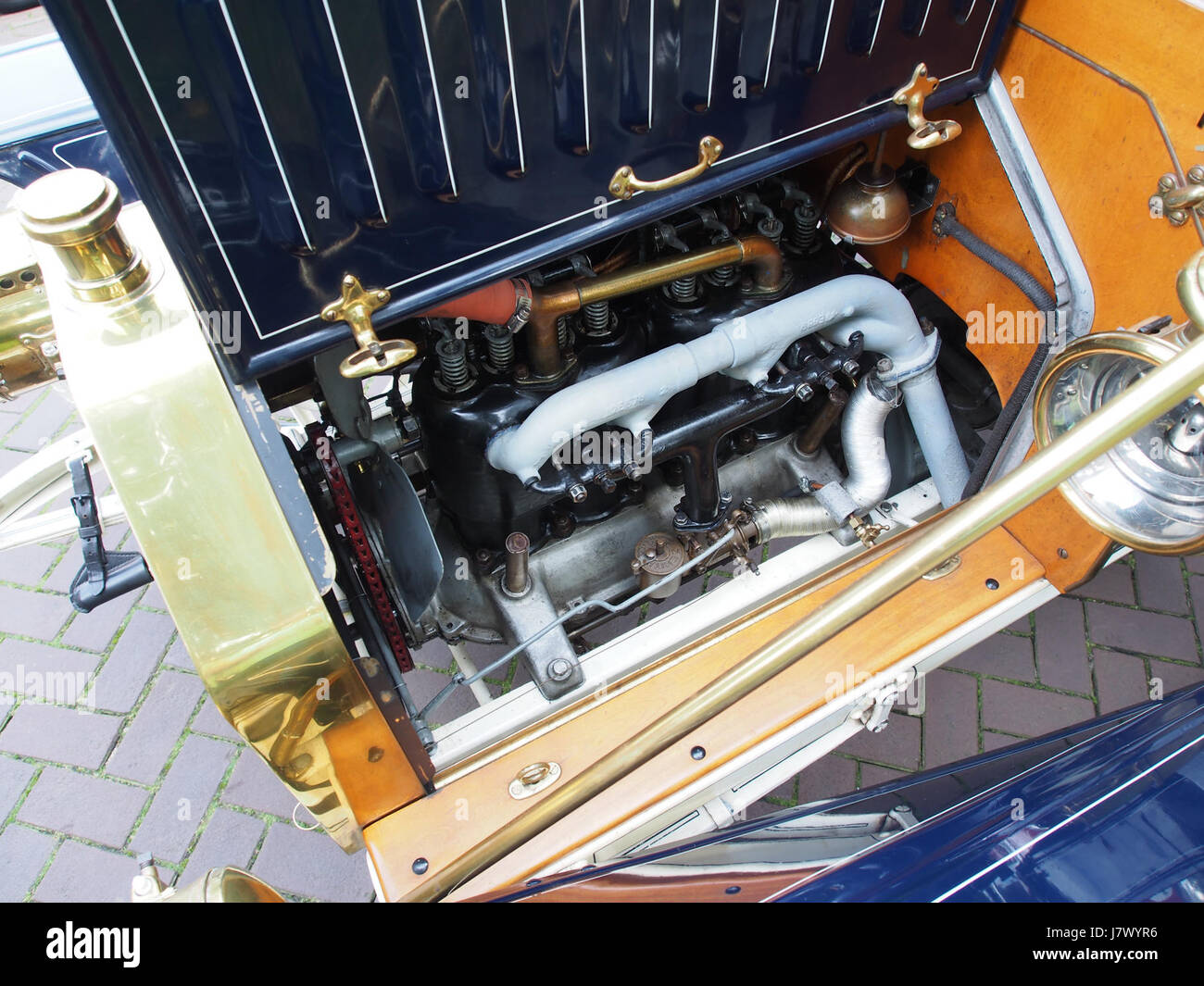 A 1910 Buick, captured in an early 20th-century photograph, showcases ...