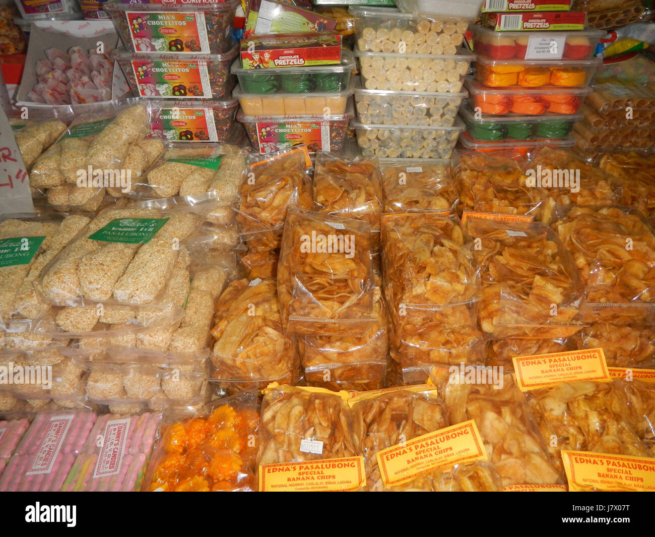 This image likely showcases various traditional Filipino delicacies ...