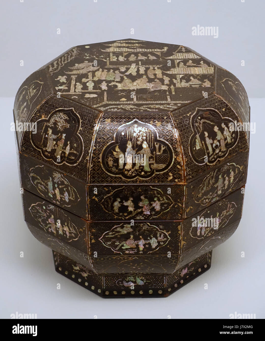 This container, originating from China, features intricate decorations ...