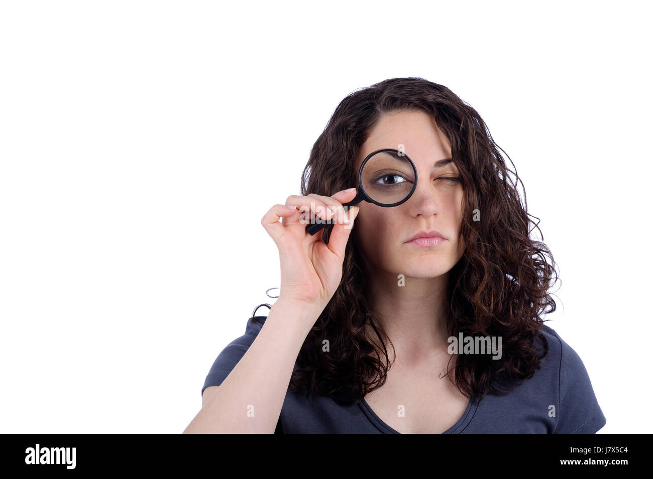 woman with magnifying glass in front of face Stock Photo - Alamy
