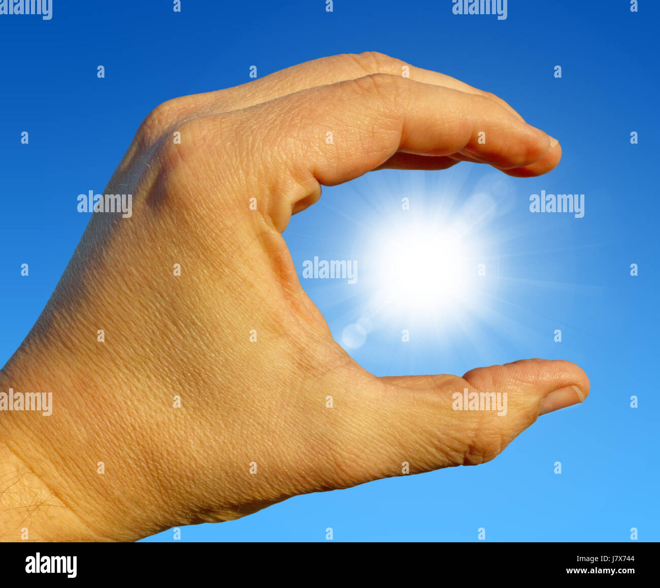 sun in hand Stock Photo - Alamy